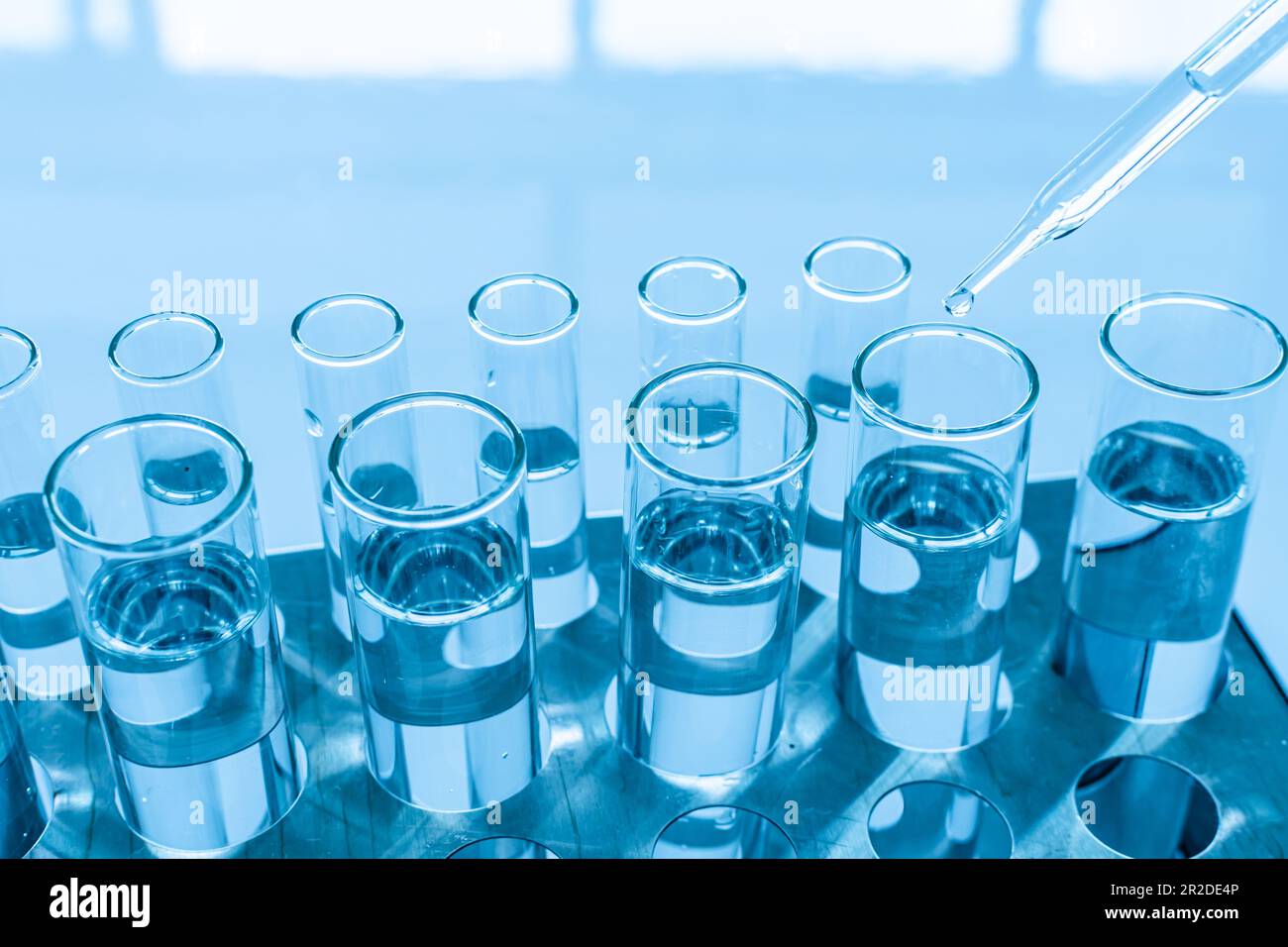Chemistry experiment concept in science lab scientific chemistry glass ...