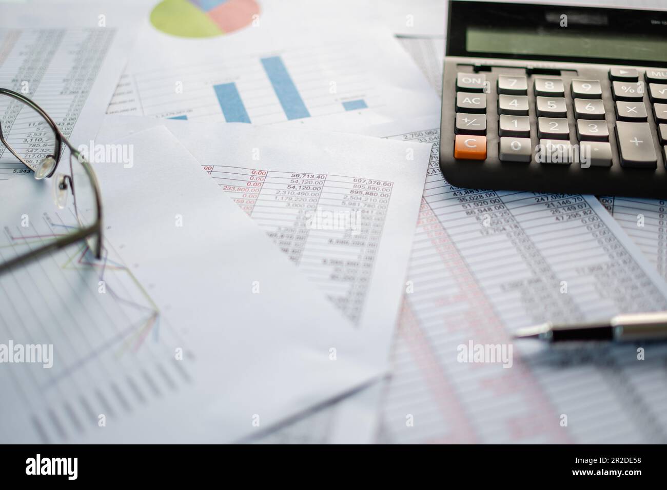 financial accounting, work from home, closeup calculator on desktop ...