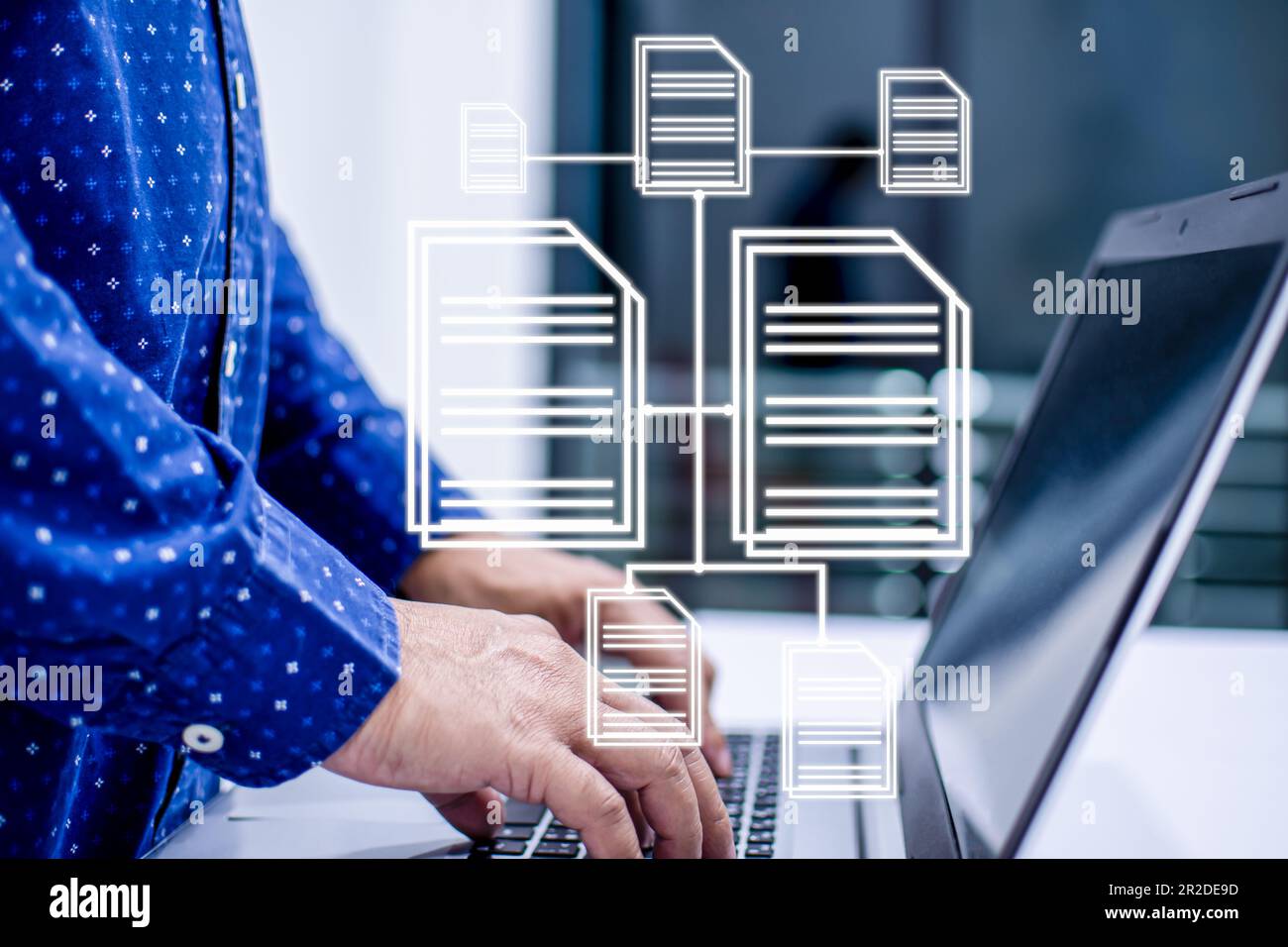 Men standing and typing a look for a database and document with a ...