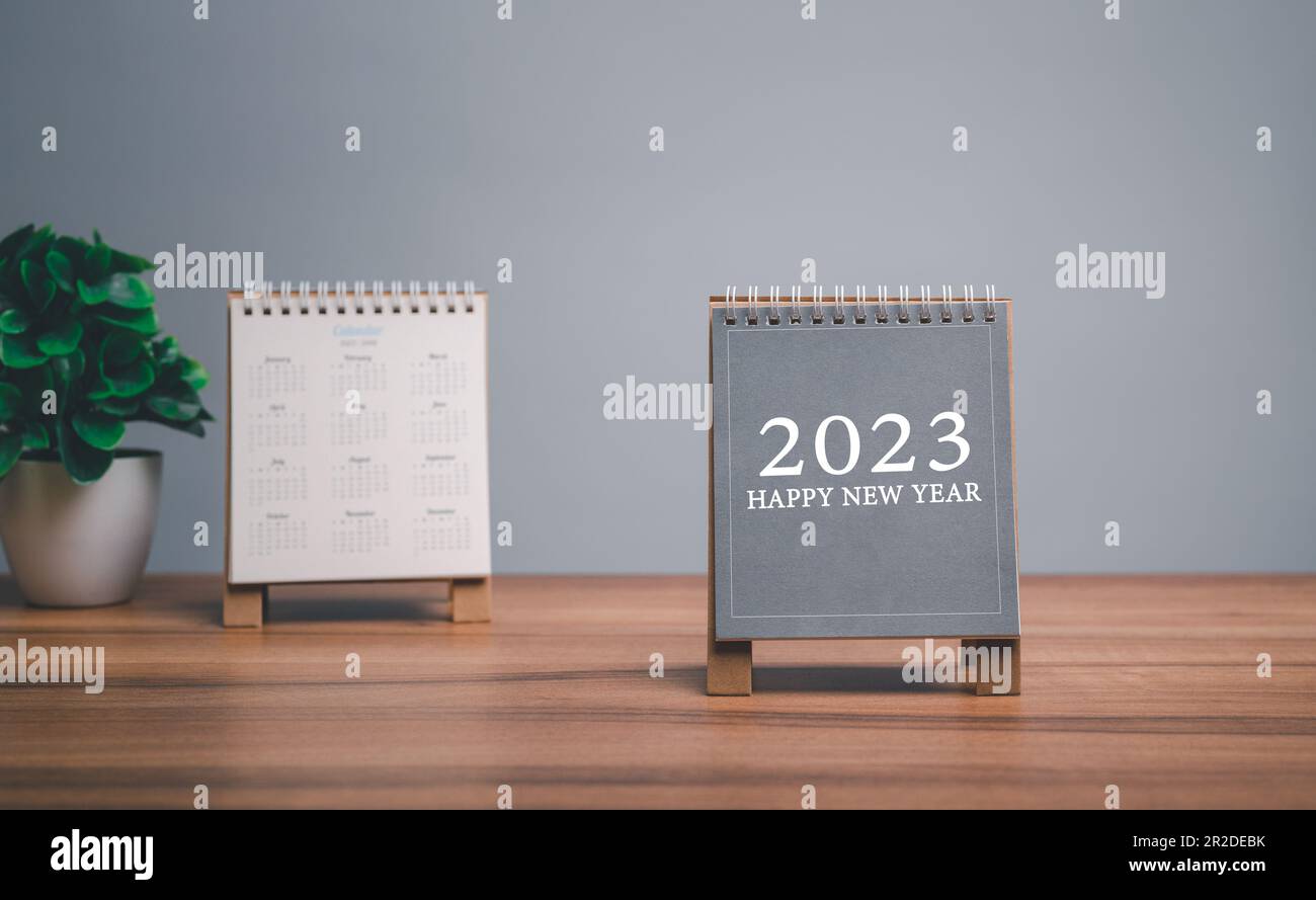 Desktop calendar for 2023 on a desk beige and white background. plans ...