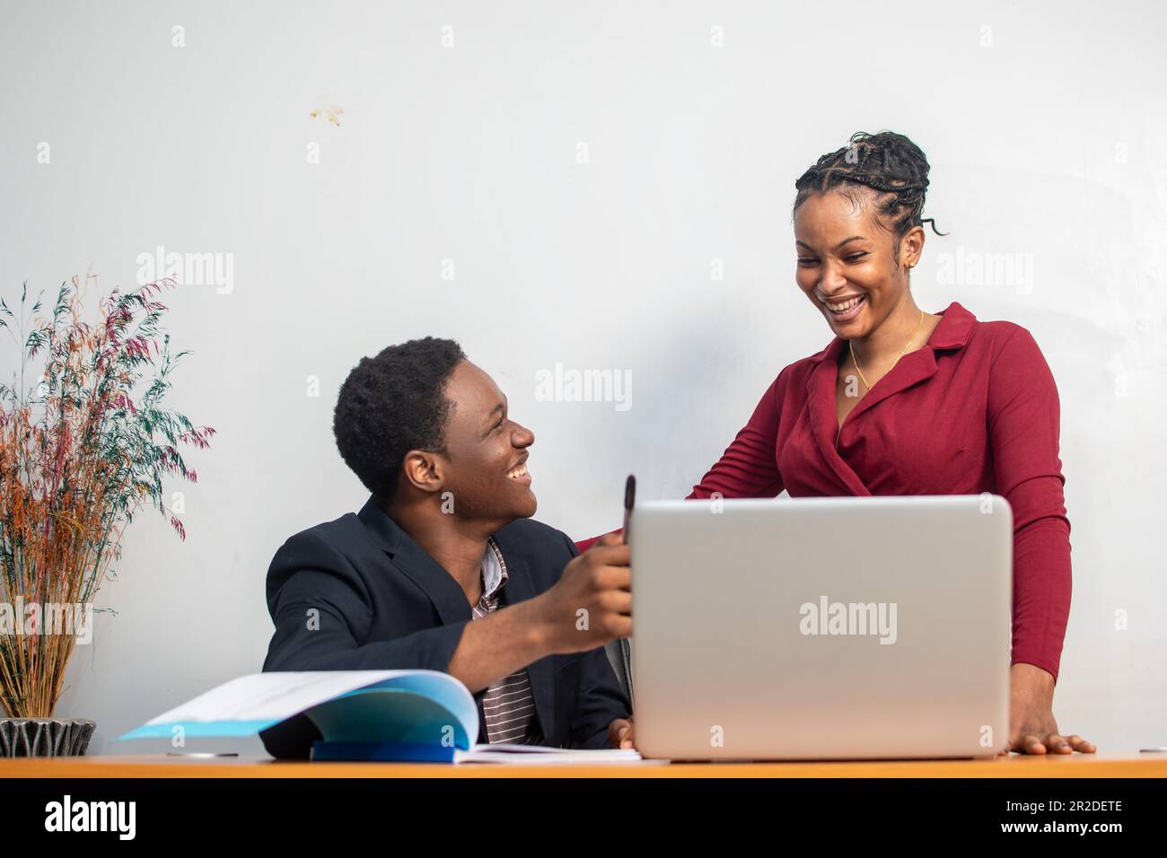 two african employees working together Stock Photo - Alamy