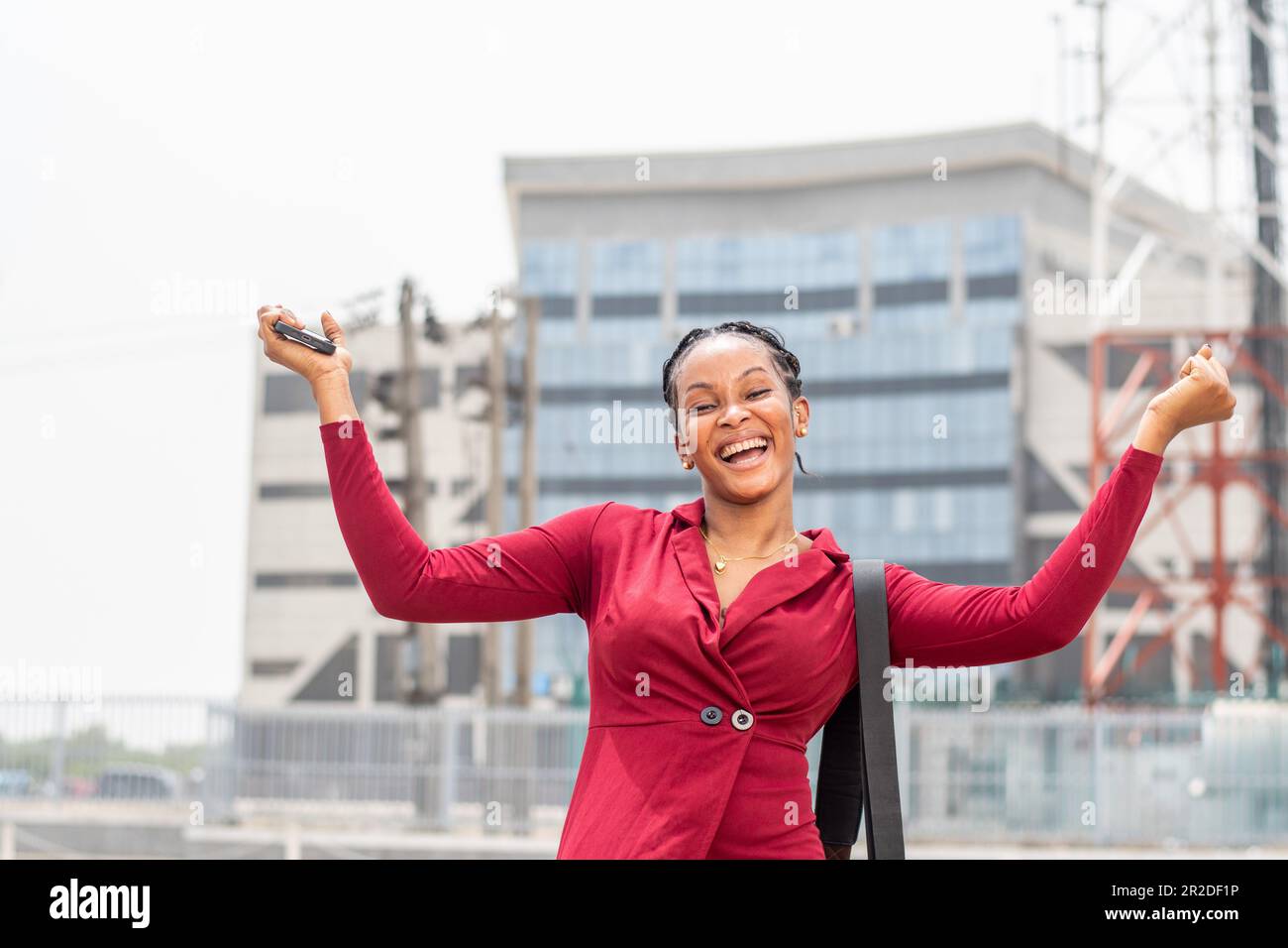 beautiful young african lady feeling happy and celebrates Stock Photo ...