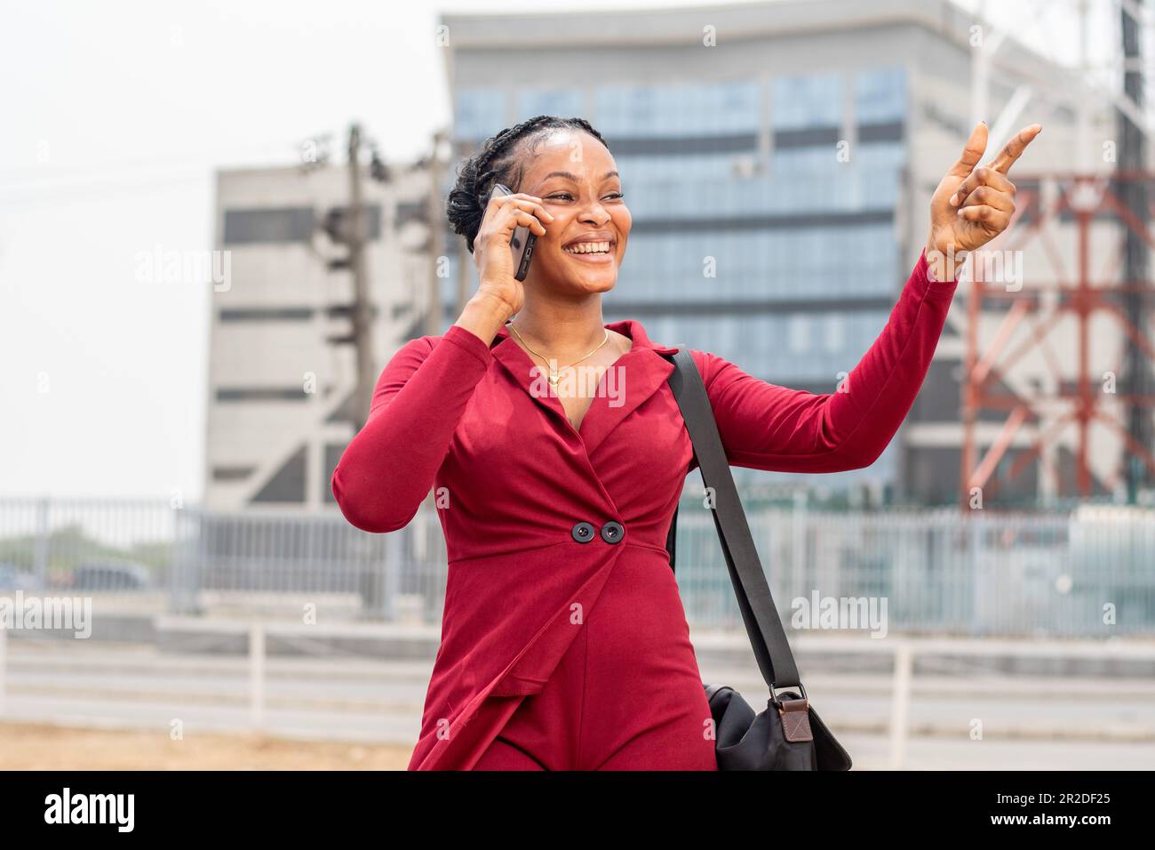 beautiful young black lady making a phone call Stock Photo - Alamy