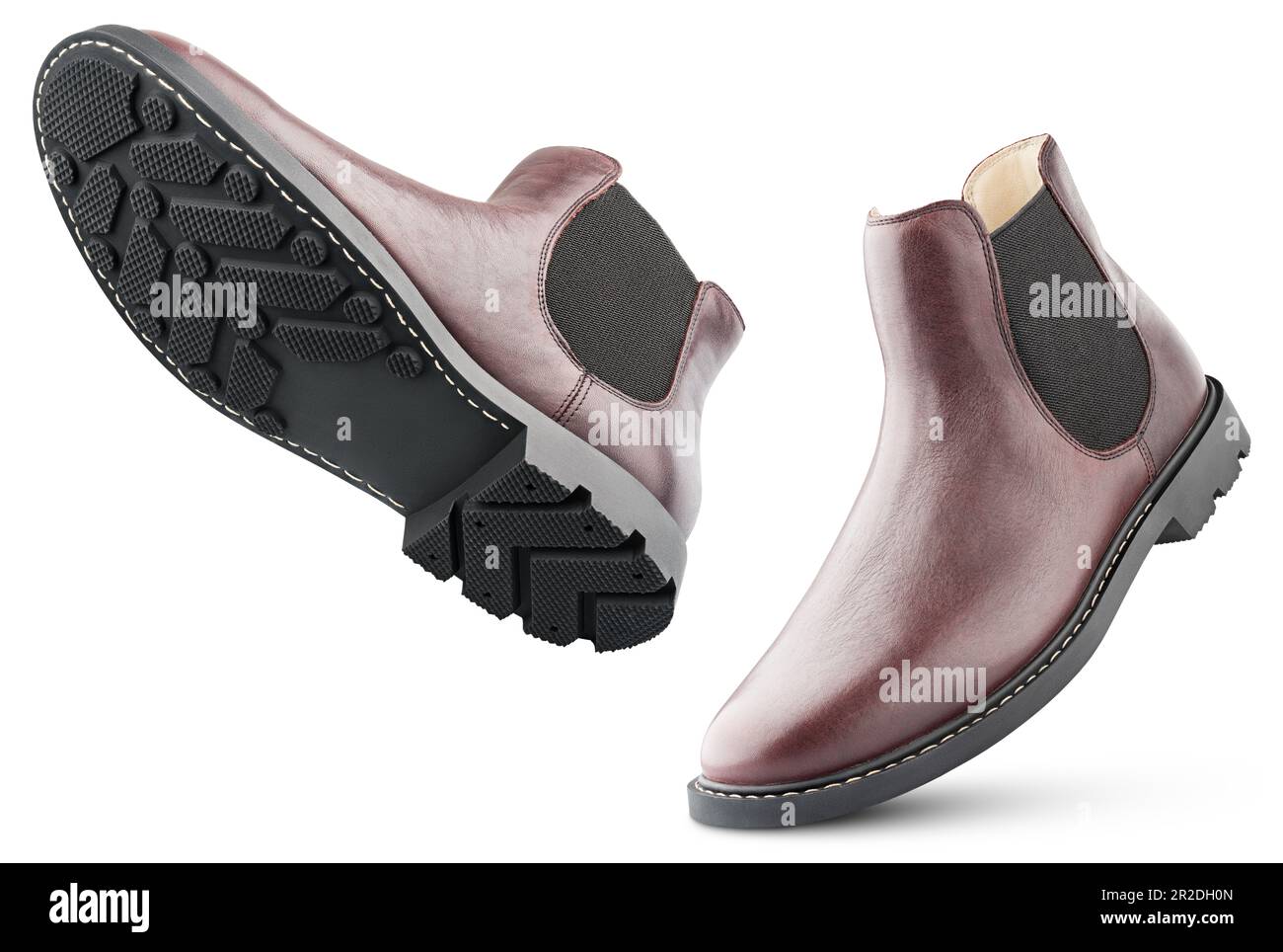 Pair of brown leather Chelsea boots isolated on white background with ...