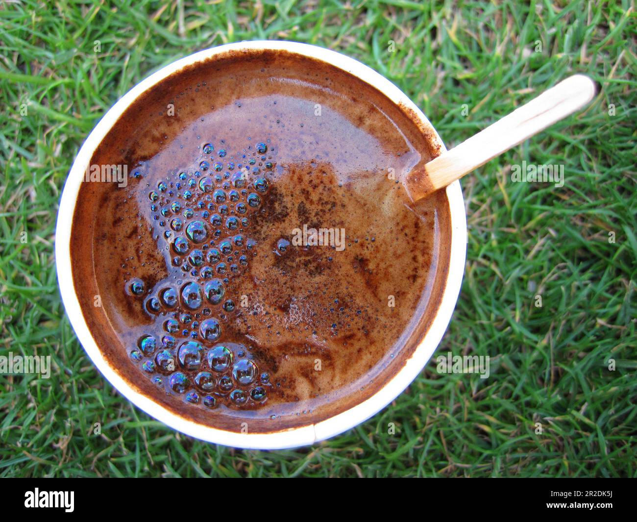 hot coffee drink in the green grass Stock Photo - Alamy