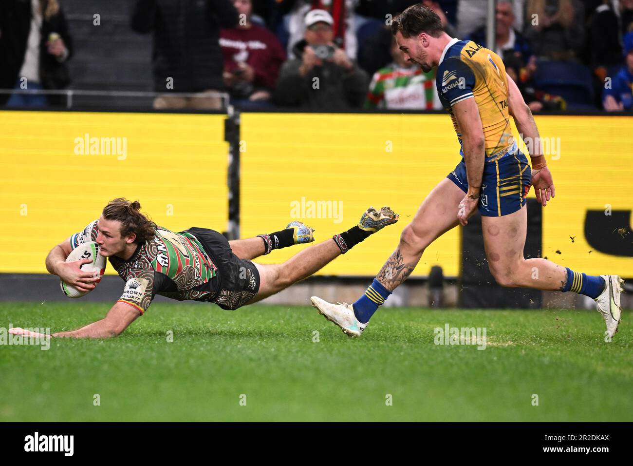 Campbell Graham of the Rabbitohs scores a try during the Round 12 NRL ...