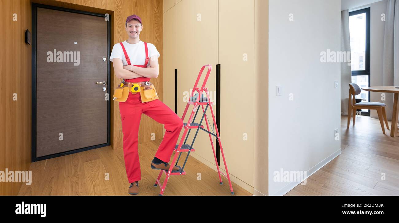 Builder handyman with construction tools. House renovation background ...