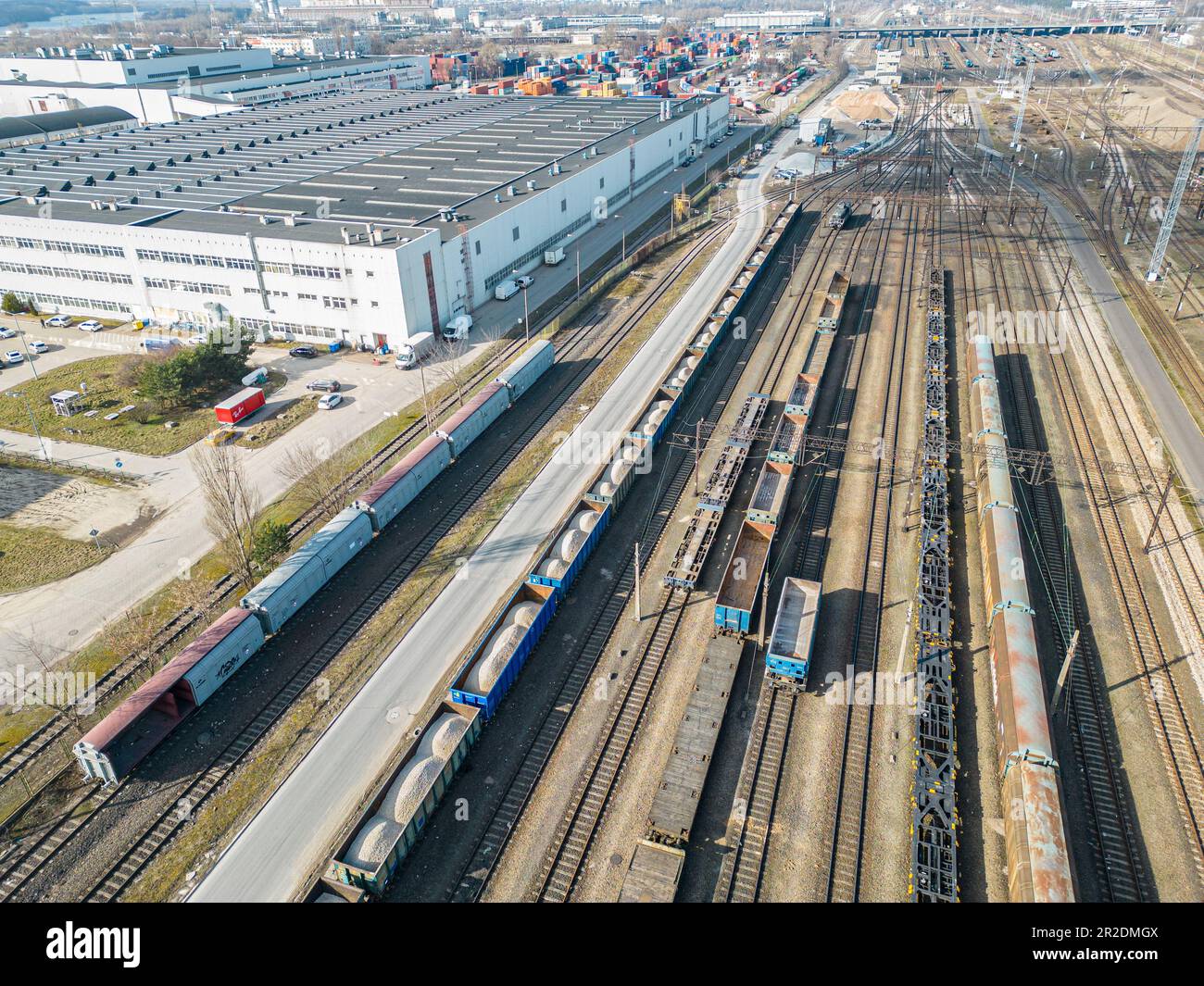 Cargo trains close-up. Aerial view of colorful freight trains on the ...