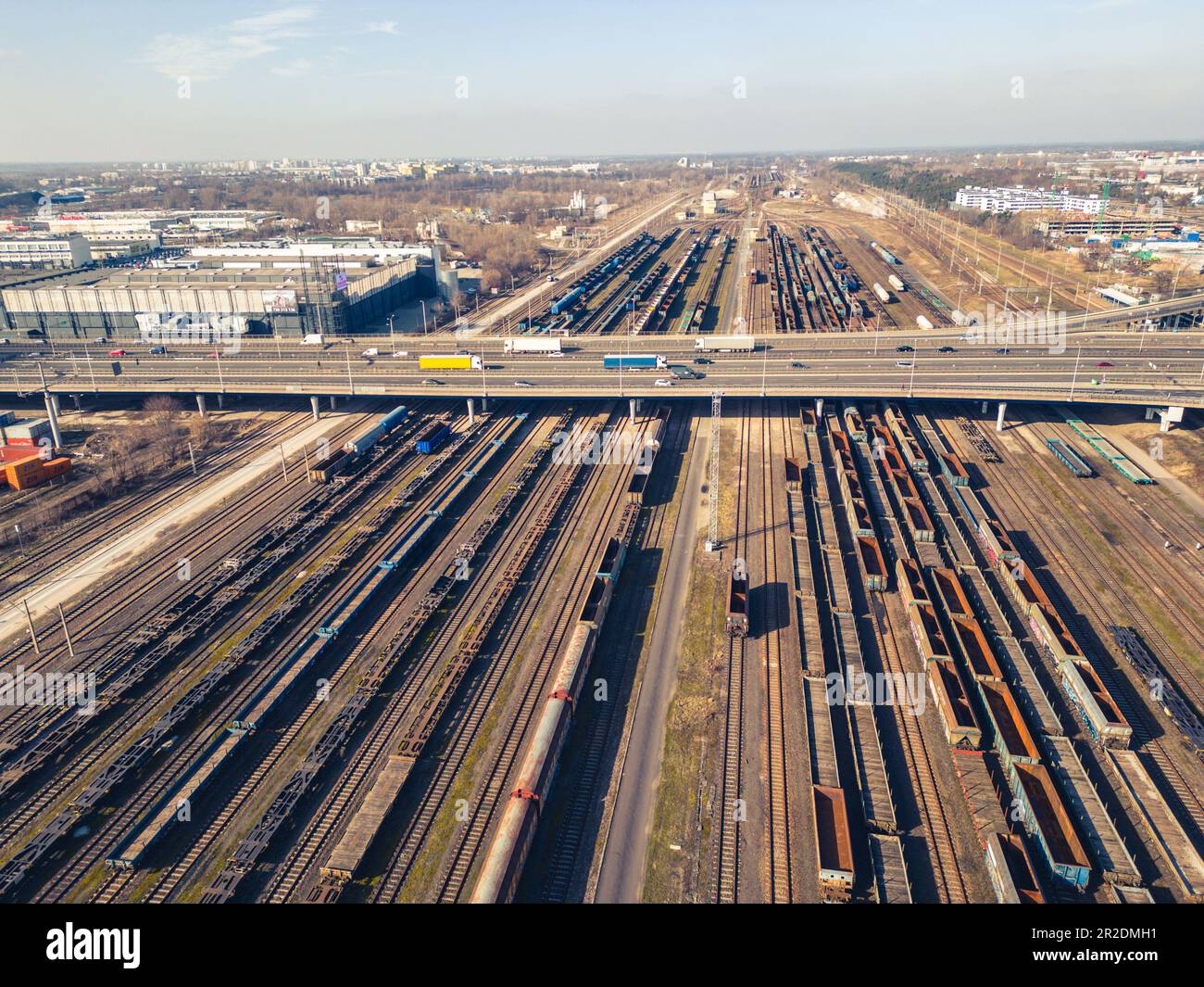 Cargo trains close-up. Aerial view of colorful freight trains on the ...