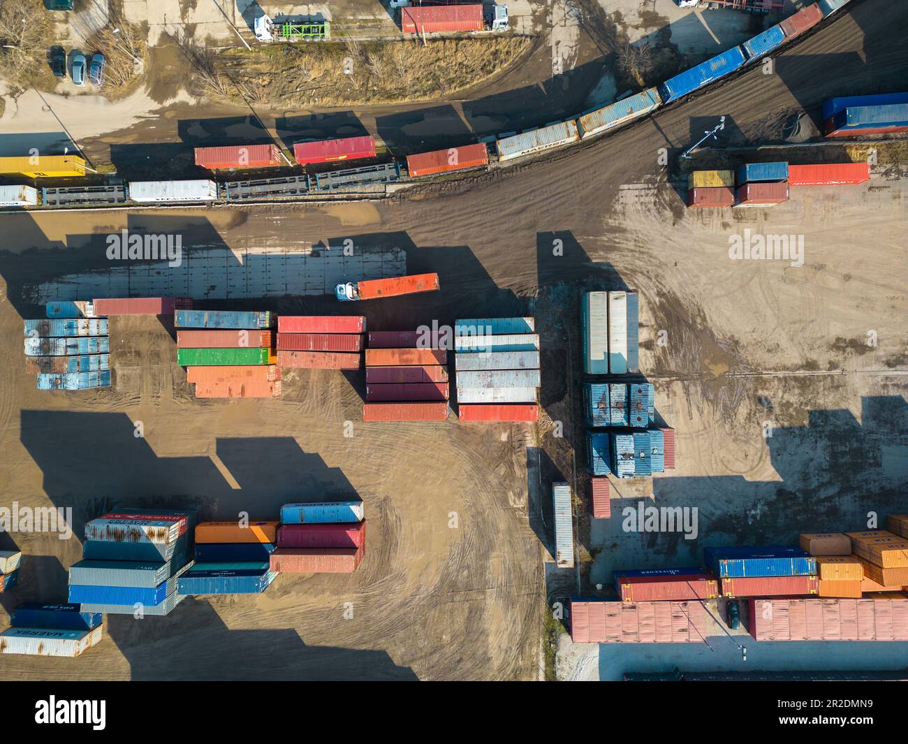 Cargo trains close-up. Aerial view of colorful freight trains on the ...