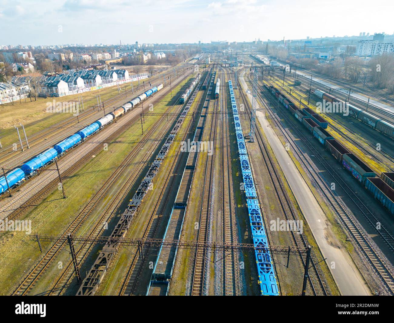 Cargo trains close-up. Aerial view of colorful freight trains on the ...