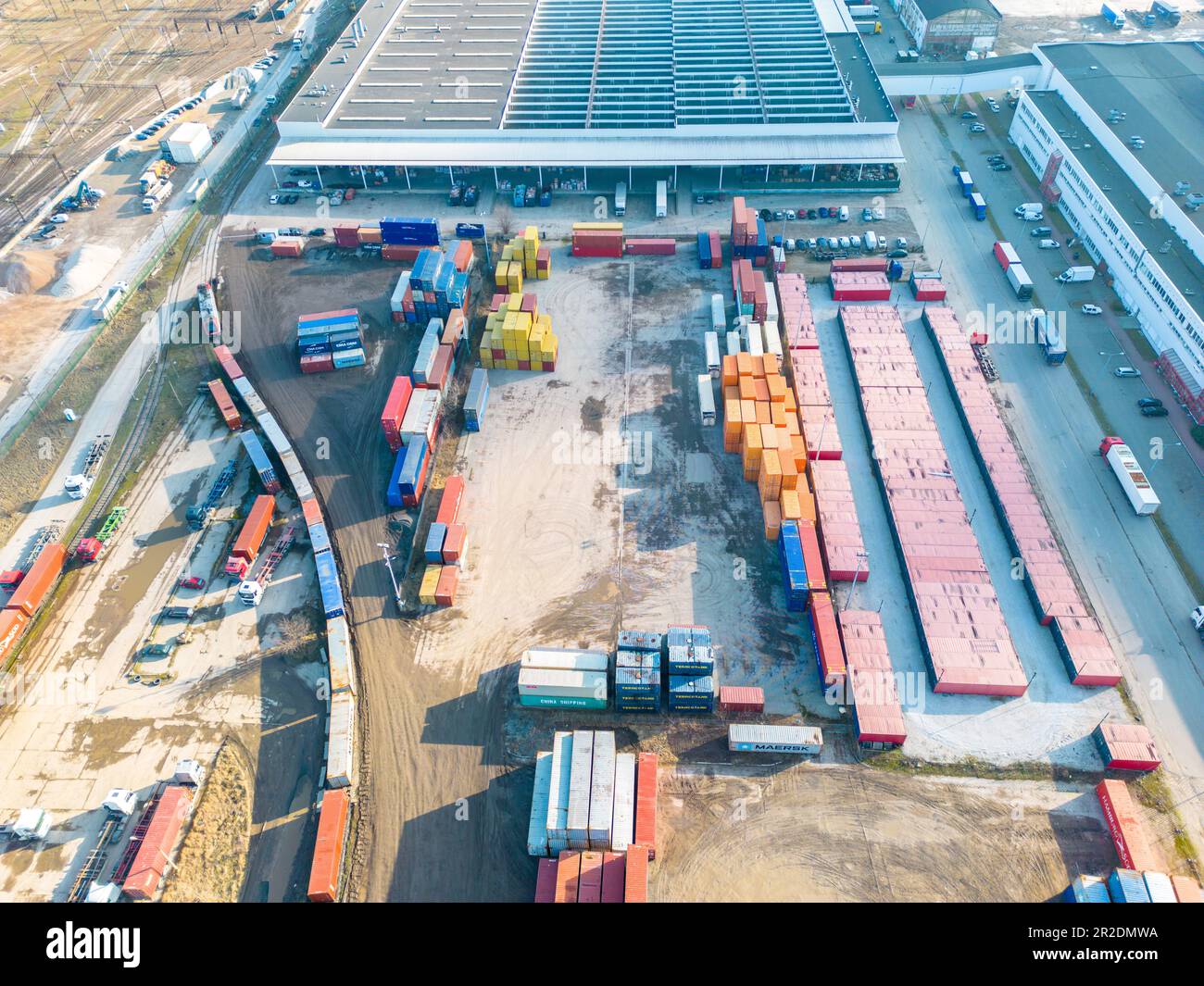 Cargo trains close-up. Aerial view of colorful freight trains on the ...