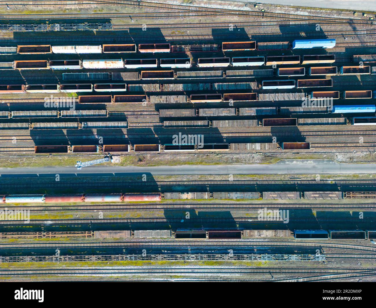 Cargo trains close-up. Aerial view of colorful freight trains on the ...