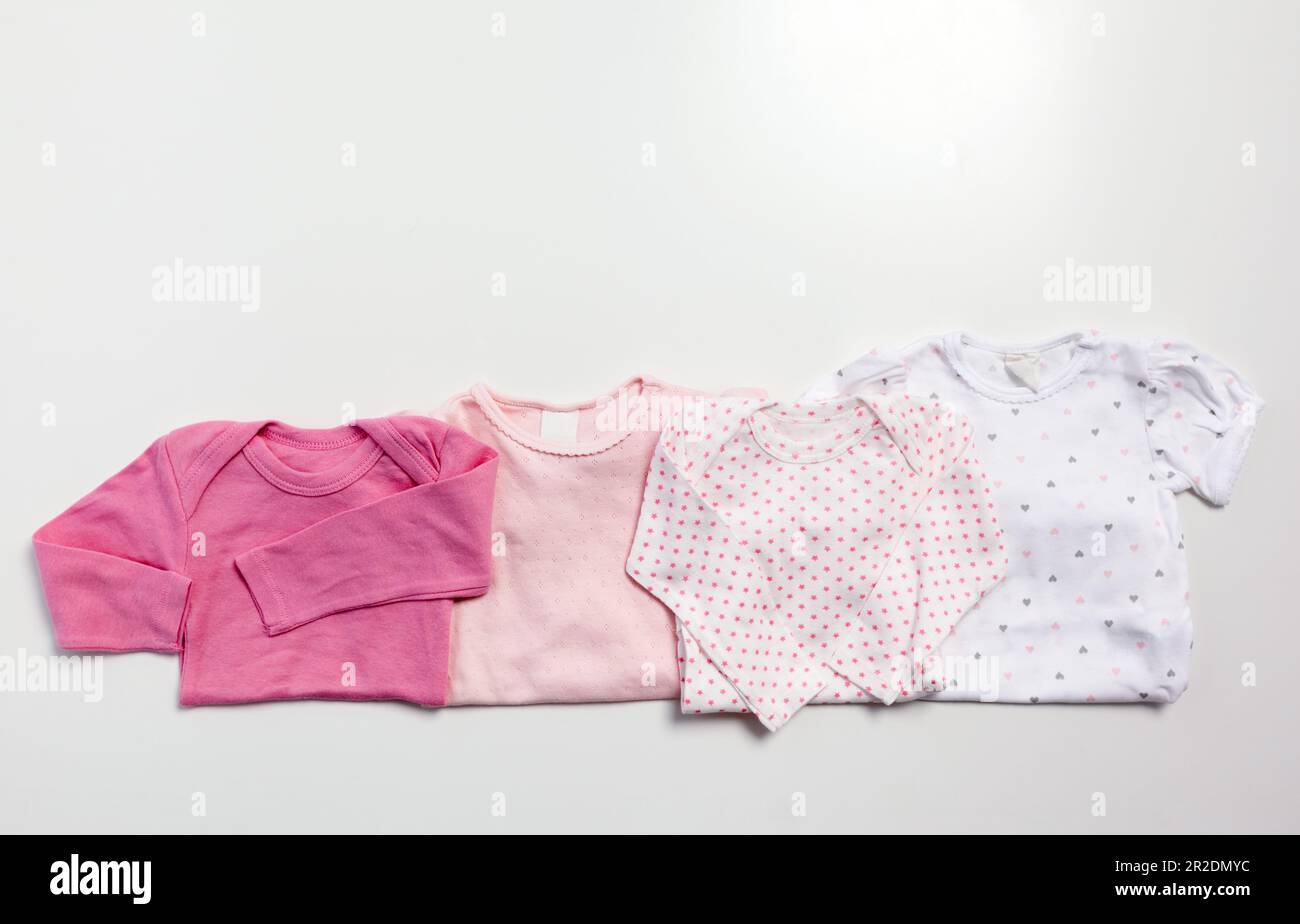Set of clothing and items for a baby Stock Photo - Alamy