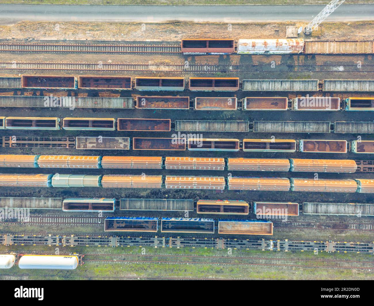 Cargo trains close-up. Aerial view of colorful freight trains on the ...