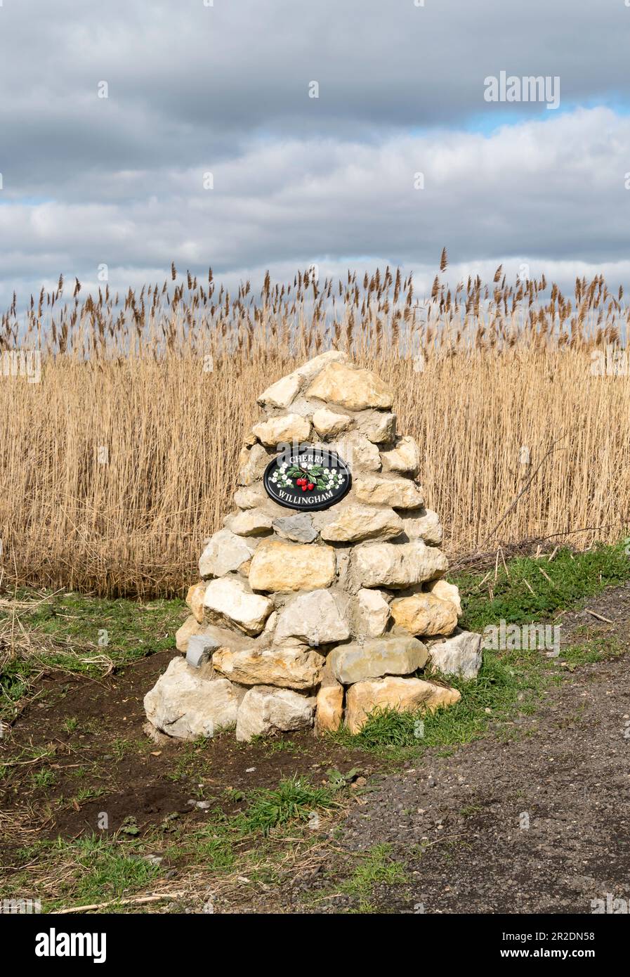 stone cairn with Cherry Willingham nameplate way marker Stock Photo - Alamy