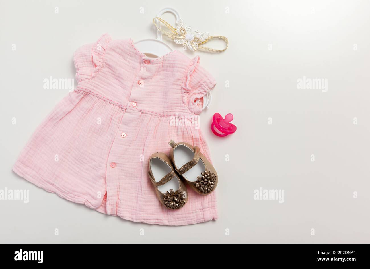 Set of clothing and items for a baby Stock Photo - Alamy