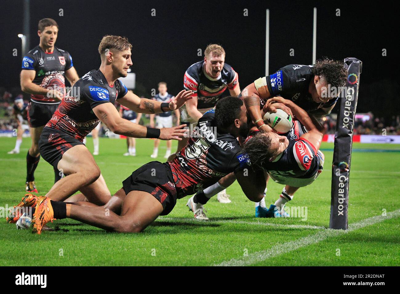 Billy Smith of the Roosters is forced into touch just short of the ...