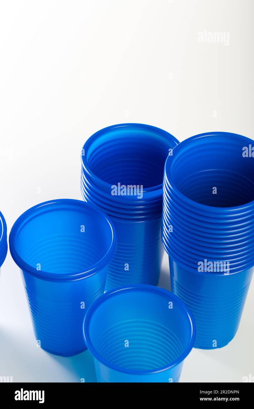 blue disposable plastic glasses Stock Photo - Alamy