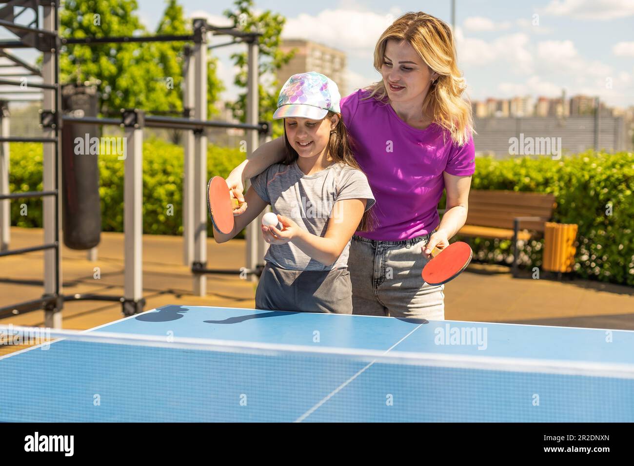 Family Playing Table Tennis