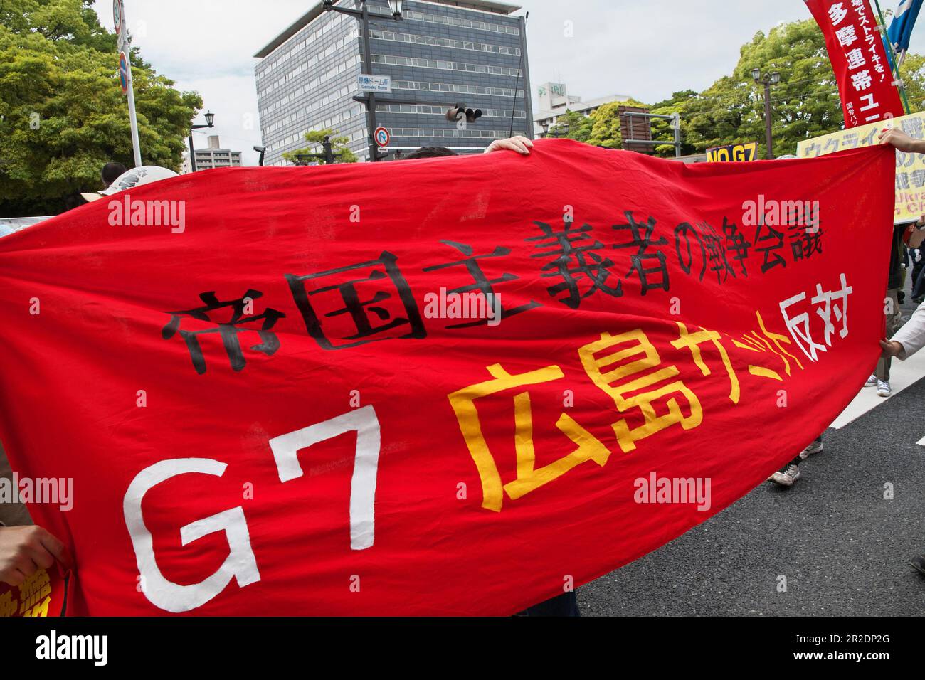 Hiroshima, Japan. 19th May, 2023. Anti-G7 protesters march at a ...
