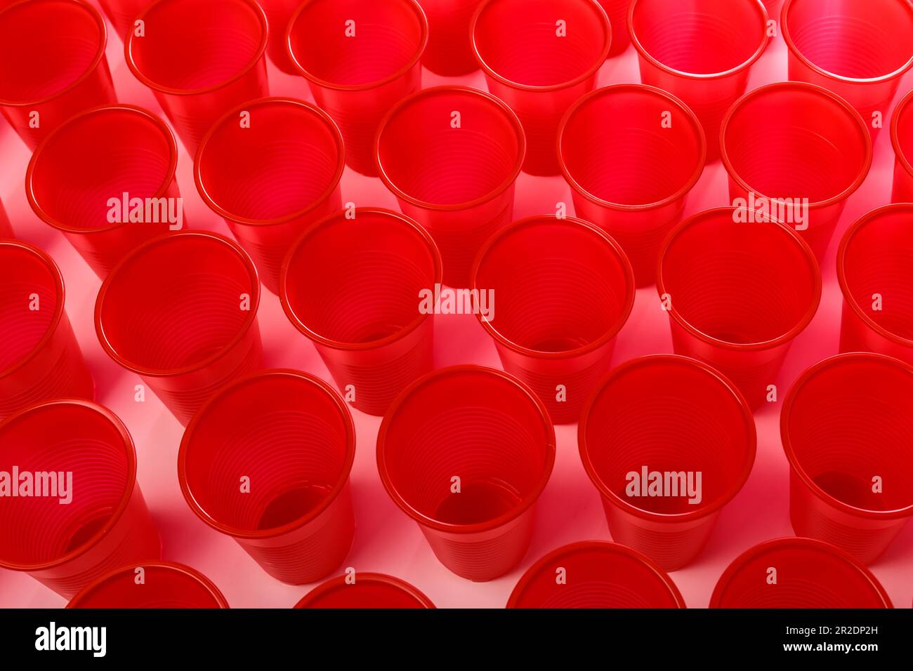 red disposable plastic glasses Stock Photo - Alamy