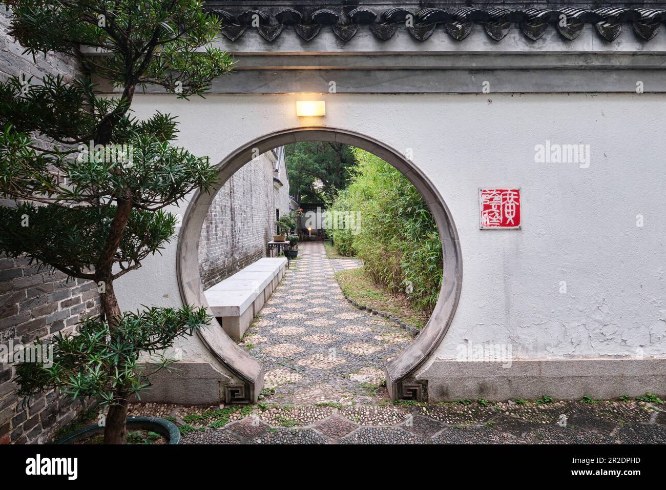 Hong Kong, China - April 10 2023: Round gate of Kowloon Walled City ...