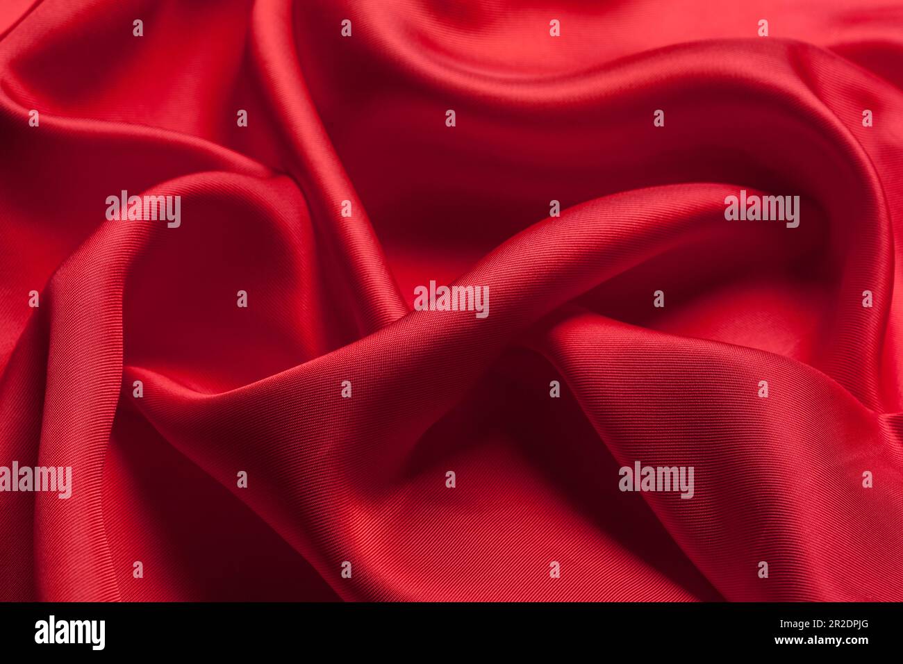 Red cloth waves background texture Stock Photo - Alamy