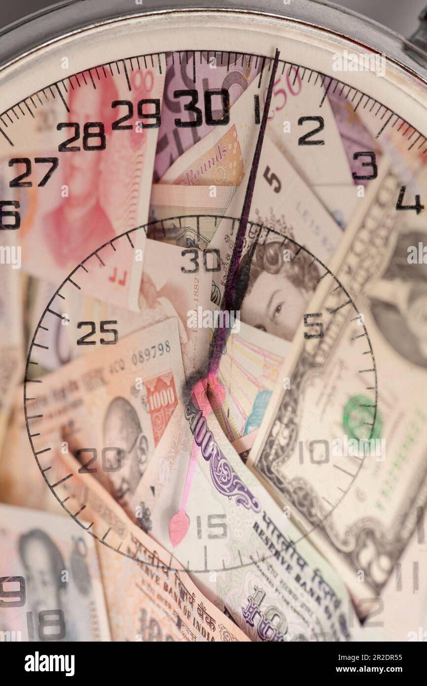 Clock face with International currencies. Time is money concept Stock ...