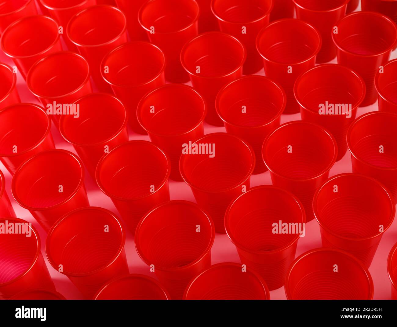 red disposable plastic glasses Stock Photo - Alamy