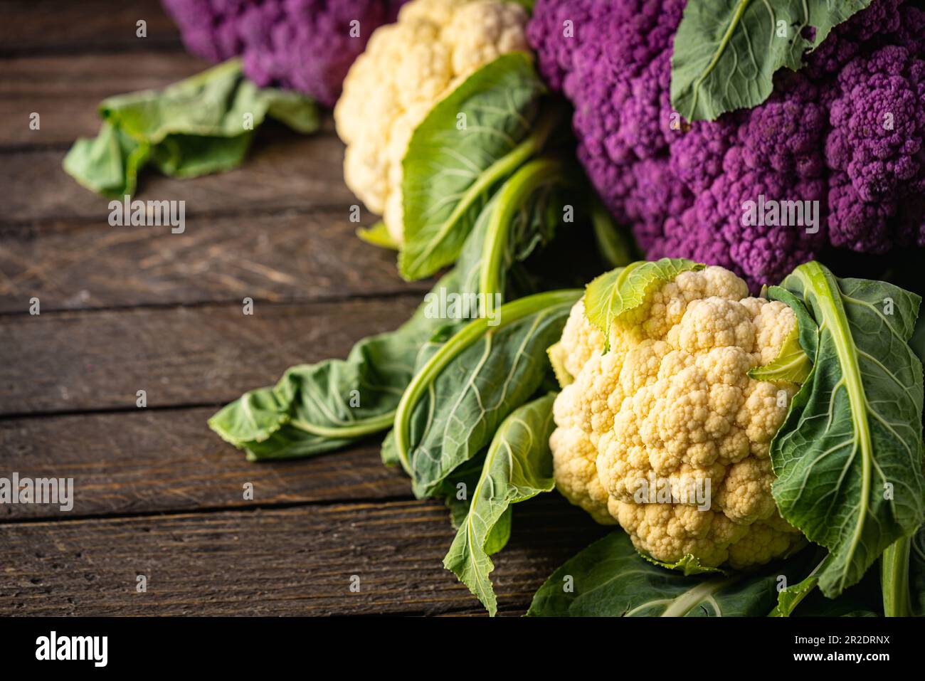 Raw fresh colorful cauliflowers Stock Photo - Alamy