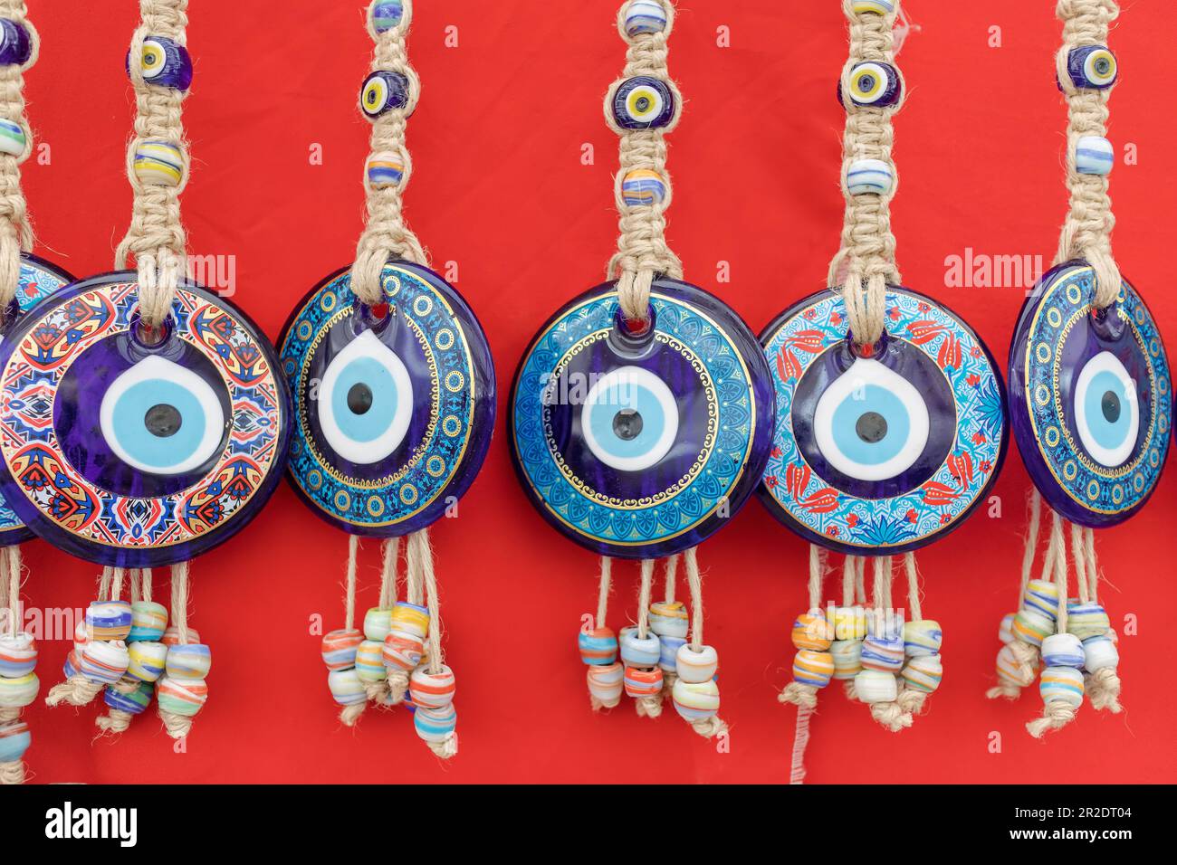 Bright colours of hand made symbolic Evil eye lucky charms and amulets ...
