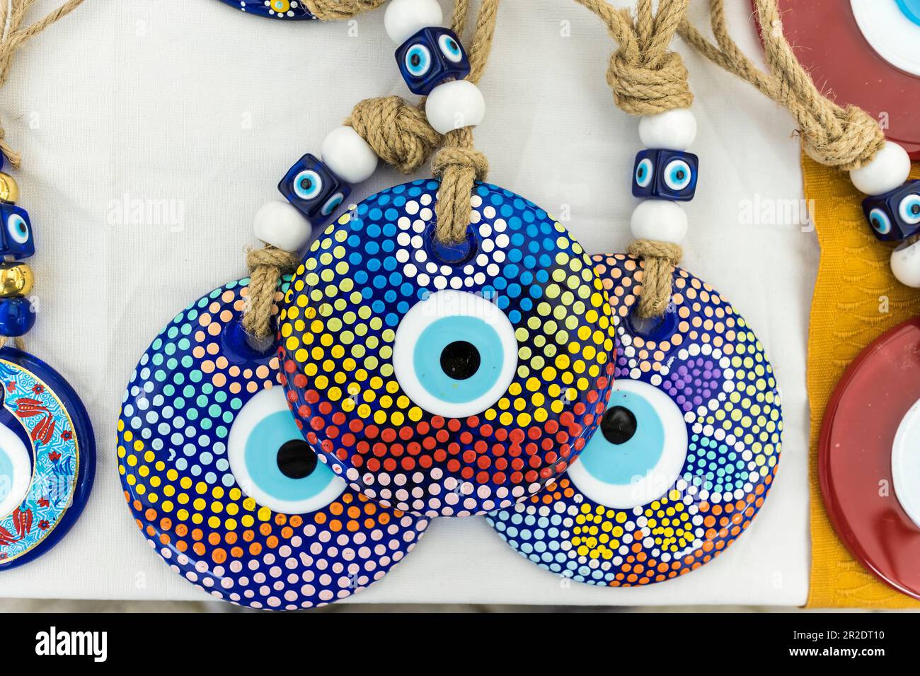 Bright colours of hand made symbolic Evil eye lucky charms and amulets ...