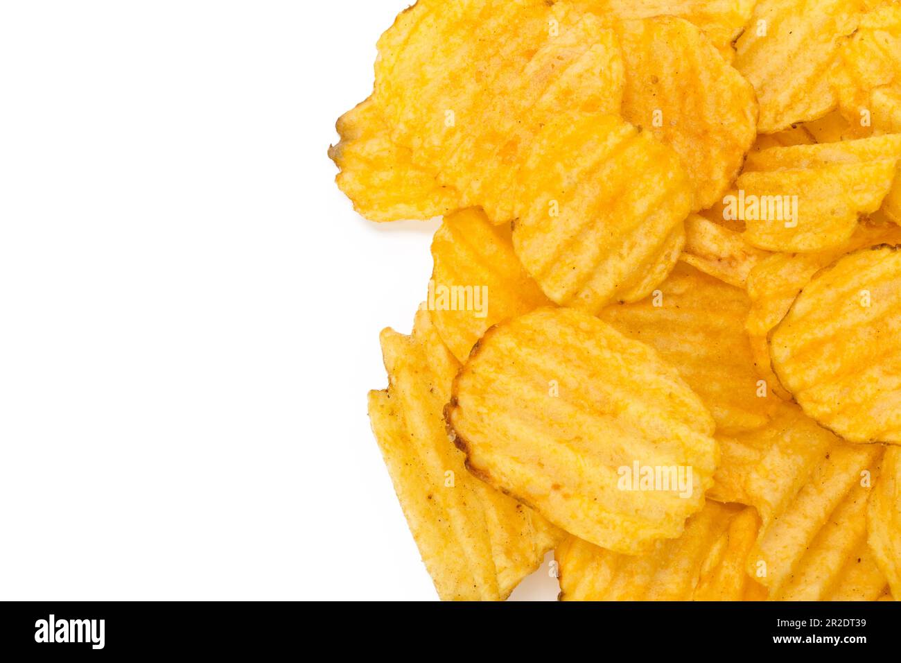 yellow potato chips isolated on white Stock Photo - Alamy