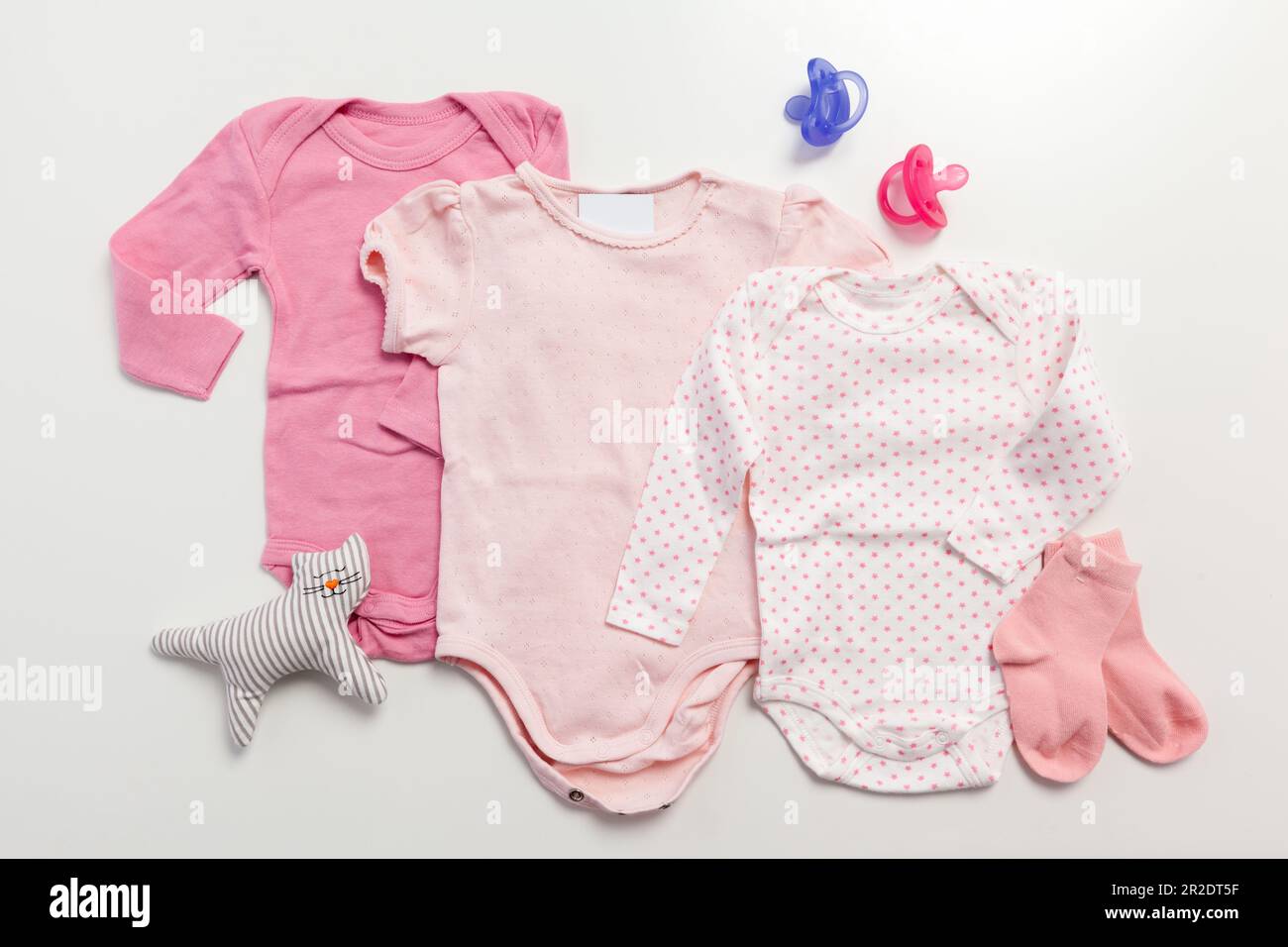 Set of clothing and items for a baby Stock Photo - Alamy