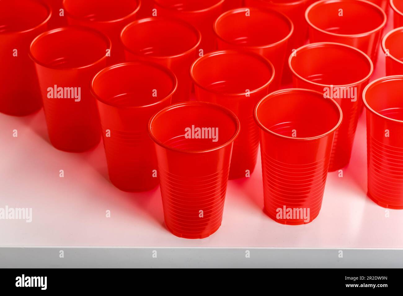 red disposable plastic glasses Stock Photo - Alamy