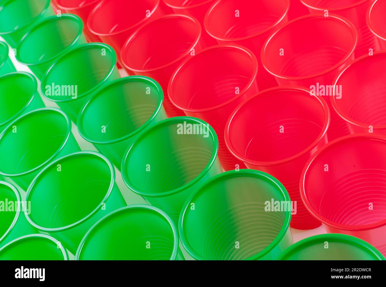 Multicolor plastic glasses isolated on white background Stock Photo - Alamy