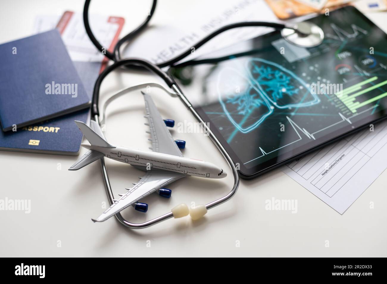 Modern social health insurance program. Tablet computer with healthcare ...