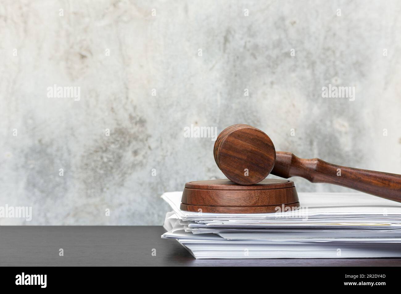 judge hammer on white paper and table Stock Photo - Alamy