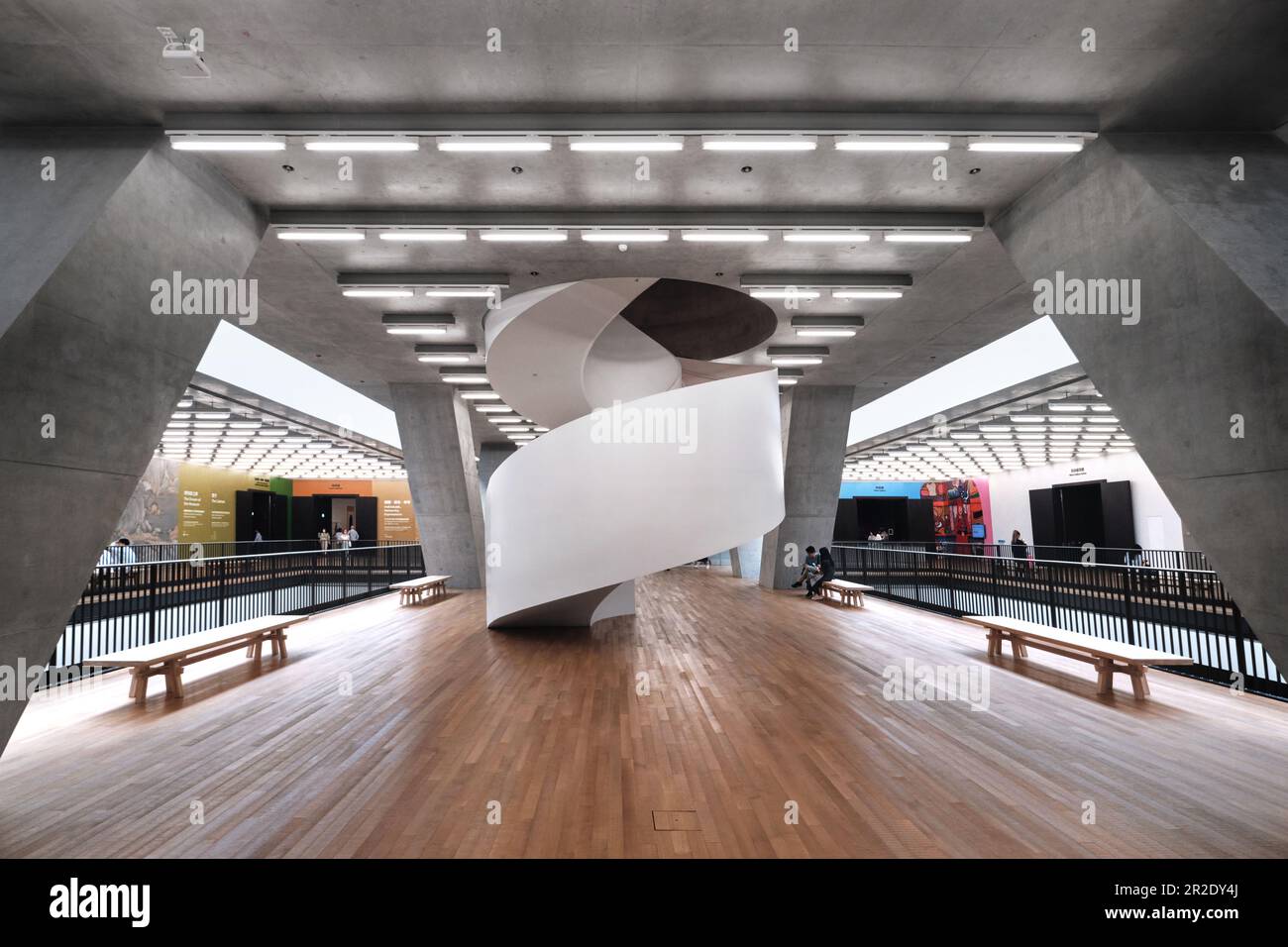 Hong Kong, China - April 10 2023: White spiral stairs in "M Plus Museum ...