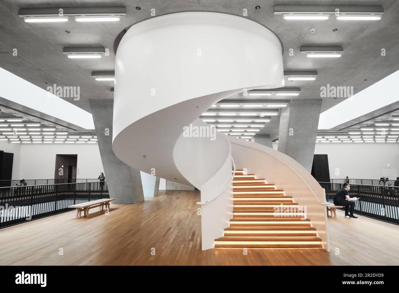 Hong Kong, China - April 10 2023: White spiral stairs in "M Plus Museum ...