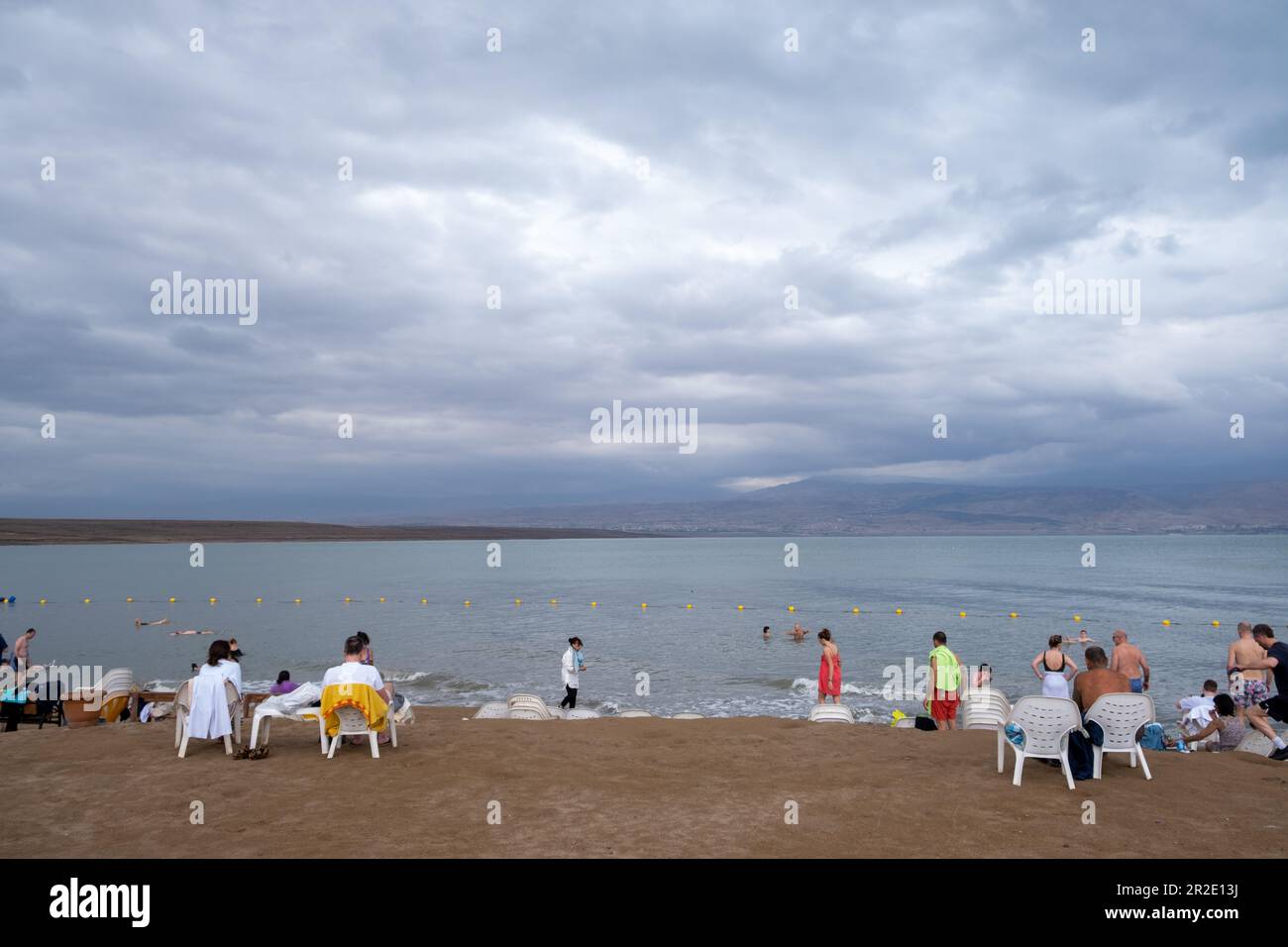 Dead Sea, Southern District, Israel - 11 April, 2023.Tourists enjoying ...