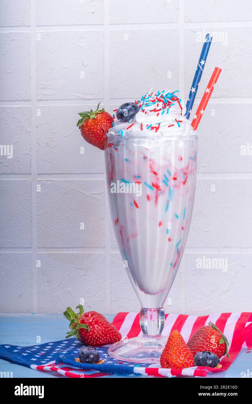 Patriotic USA American loaded milkshake, sweet dessert with red, white ...