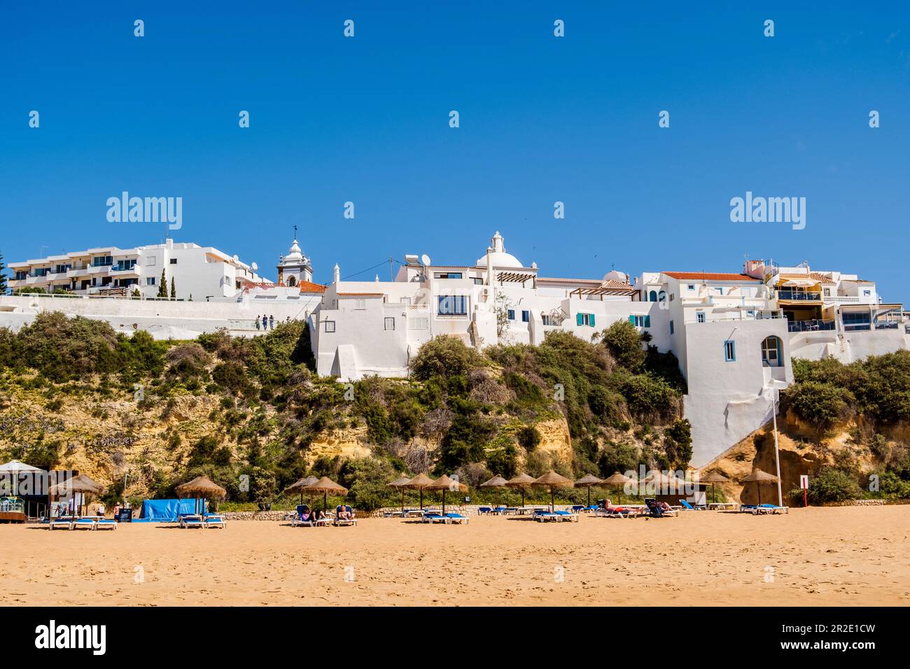 Awesome view of Albufeira whitewashed houses on cliff, Praia dos ...