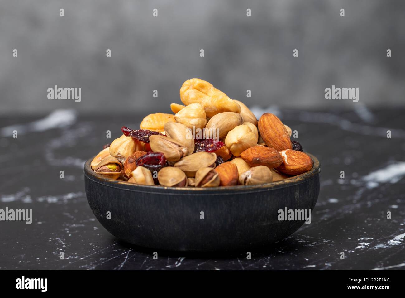 Mixed nuts. Nuts, pistachios, peanuts, almonds, cashews. Mixed nuts on ...