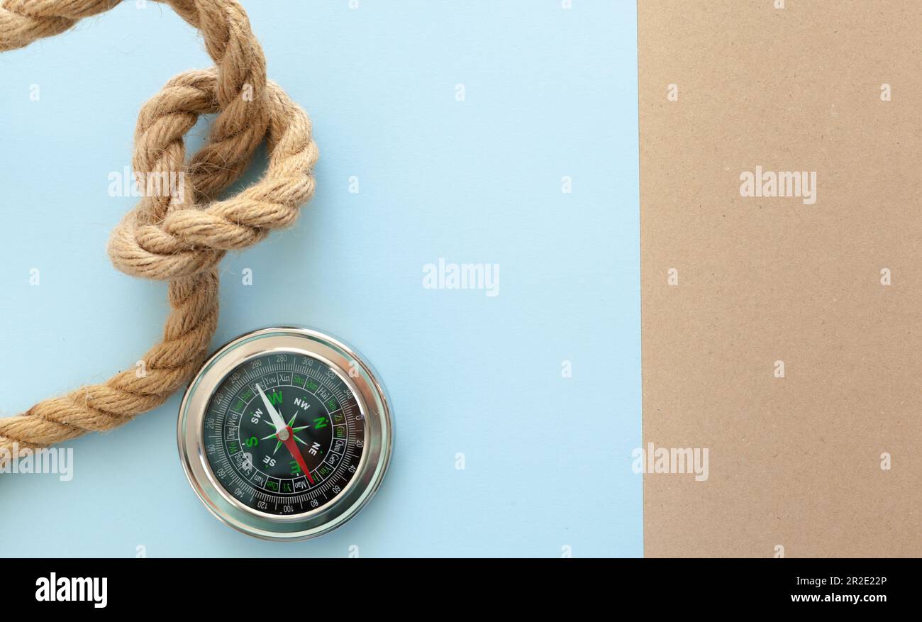 ship ropes and compass Stock Photo - Alamy