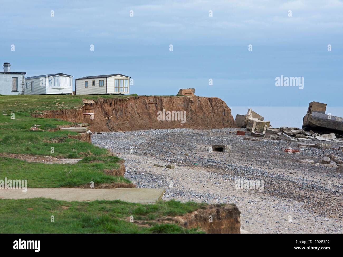 Chalets in the Sandy Beaches Holiday Village. Kilnsea,undercut by cliff ...