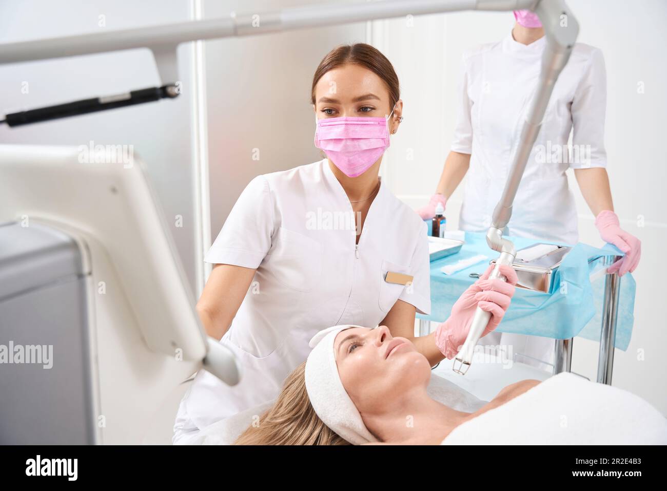 Doctor female at the workplace in clinic of aesthetic medicine Stock ...