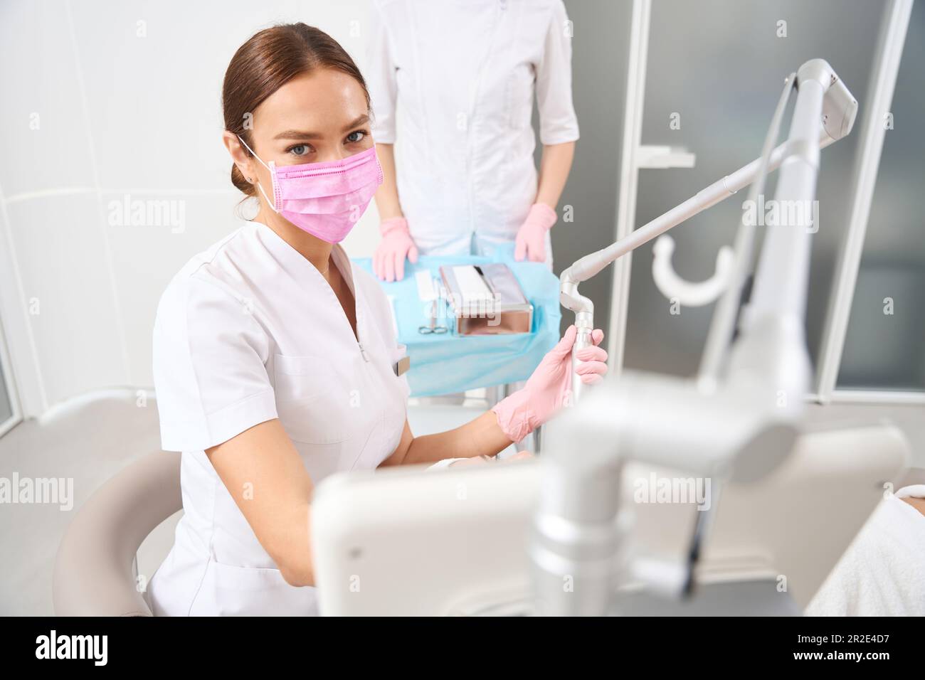 Cute doctor at workplace in aesthetic medicine clinic Stock Photo - Alamy