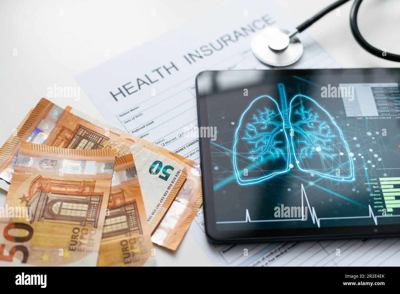 Modern social health insurance program. Tablet computer with healthcare ...